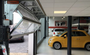 Compact Folding Sectional Door - Raxdoor